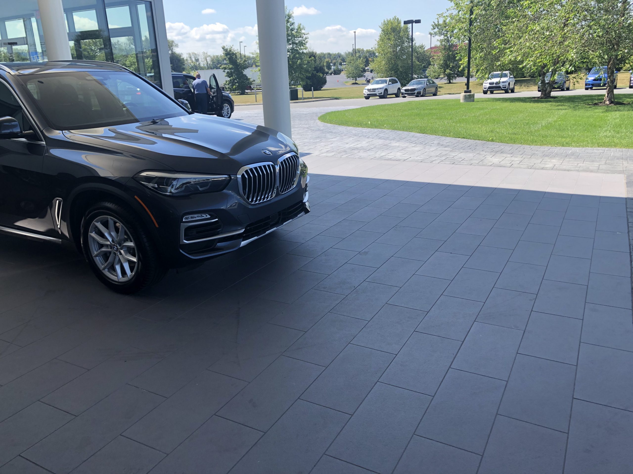 Fast-track tile installation helps drive customers into BMW dealerships ...