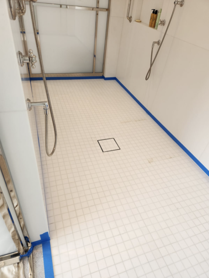 Adding anti-slip treatment to a mosaic marble shower floor - TileLetter